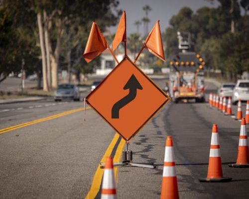 Reverse Curve Right Roll-Up Sign - Bone | SONCO