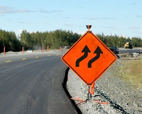 Reverse Curve Right Roll-Up Sign - Bone | SONCO